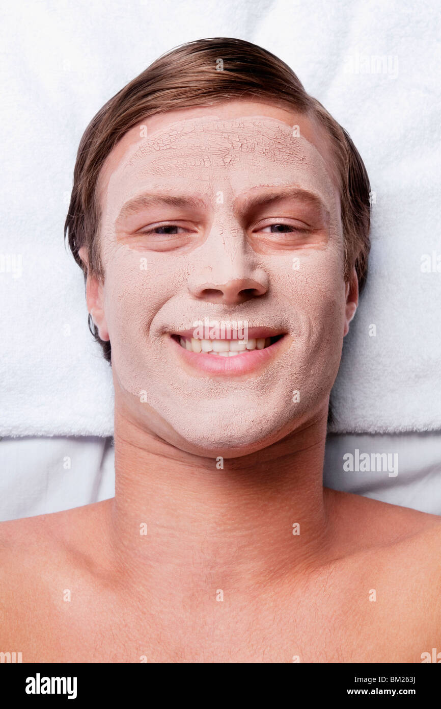 Man with face pack on his face Stock Photo - Alamy
