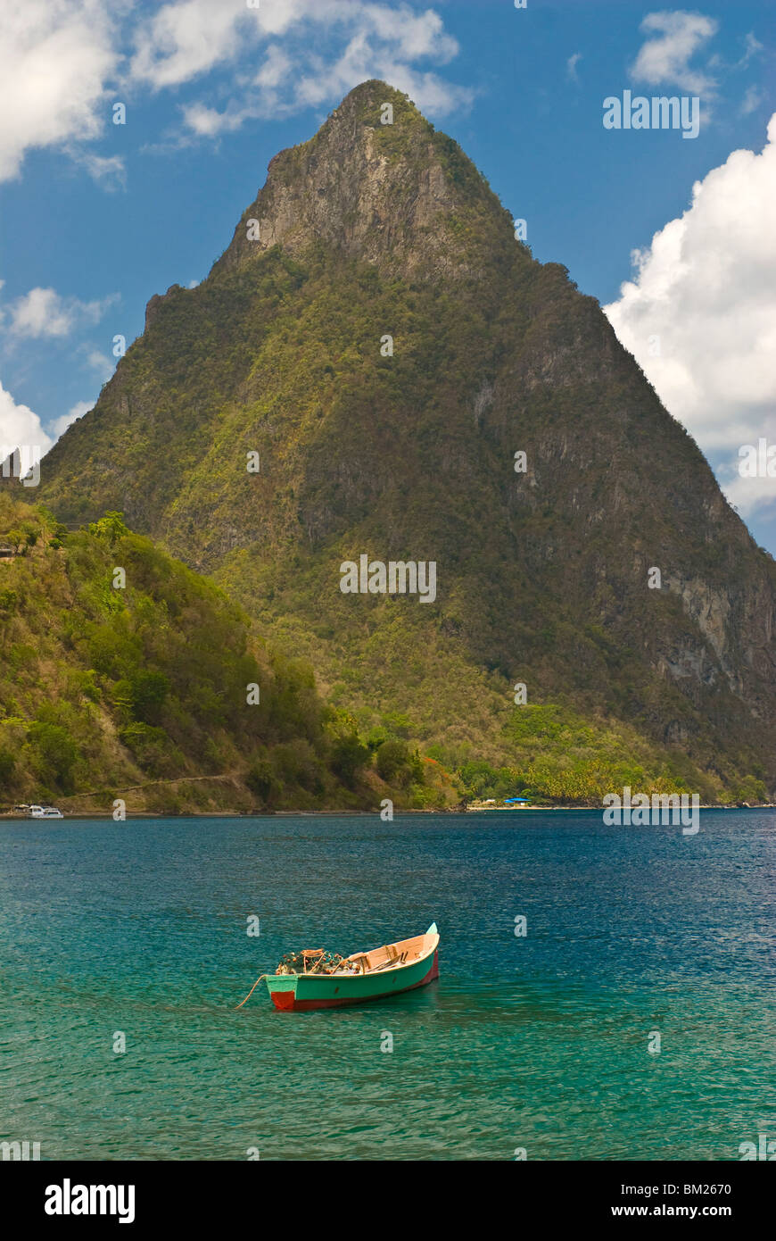 A wooden rowboat is lying in the Atlantic Ocean, St. Lucia, Windward ...