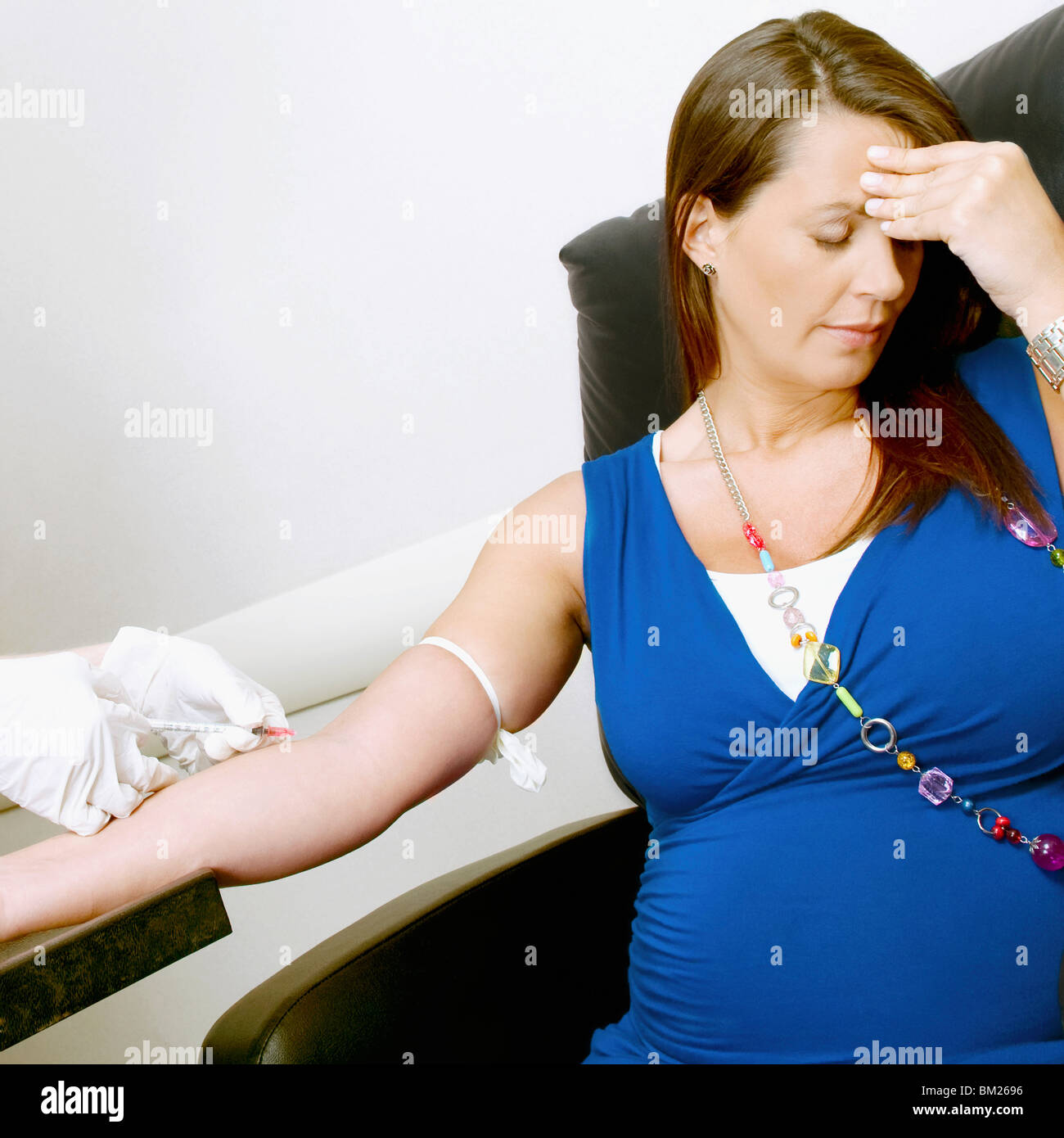 Woman blood test unhappy hi-res stock photography and images - Alamy