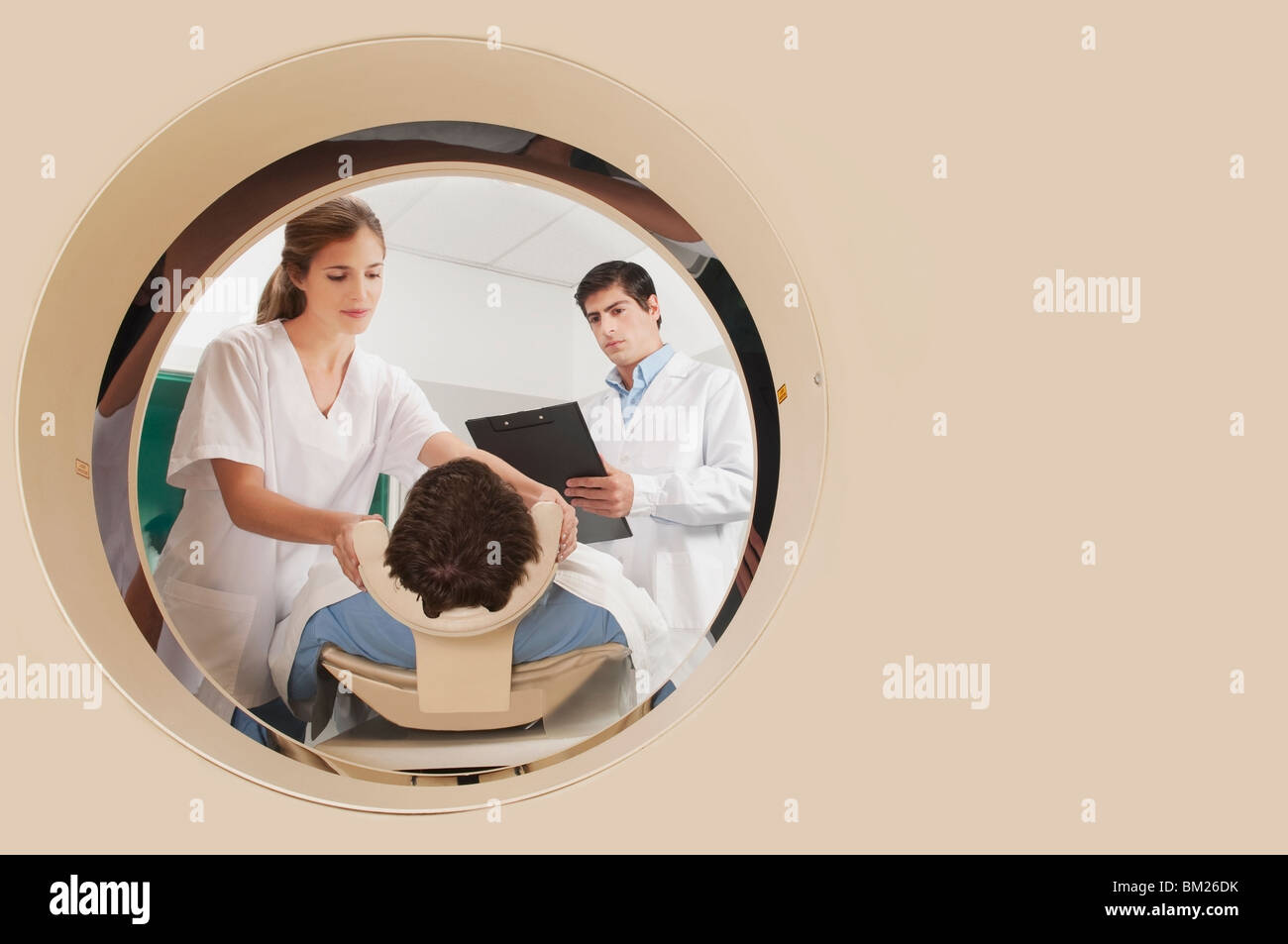 Doctor and nurse preparing a patient for MRI scan Stock Photo - Alamy