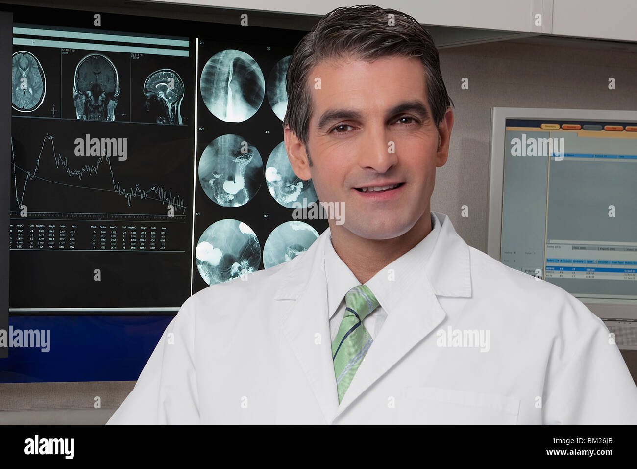 Portrait of a doctor smiling Stock Photo - Alamy