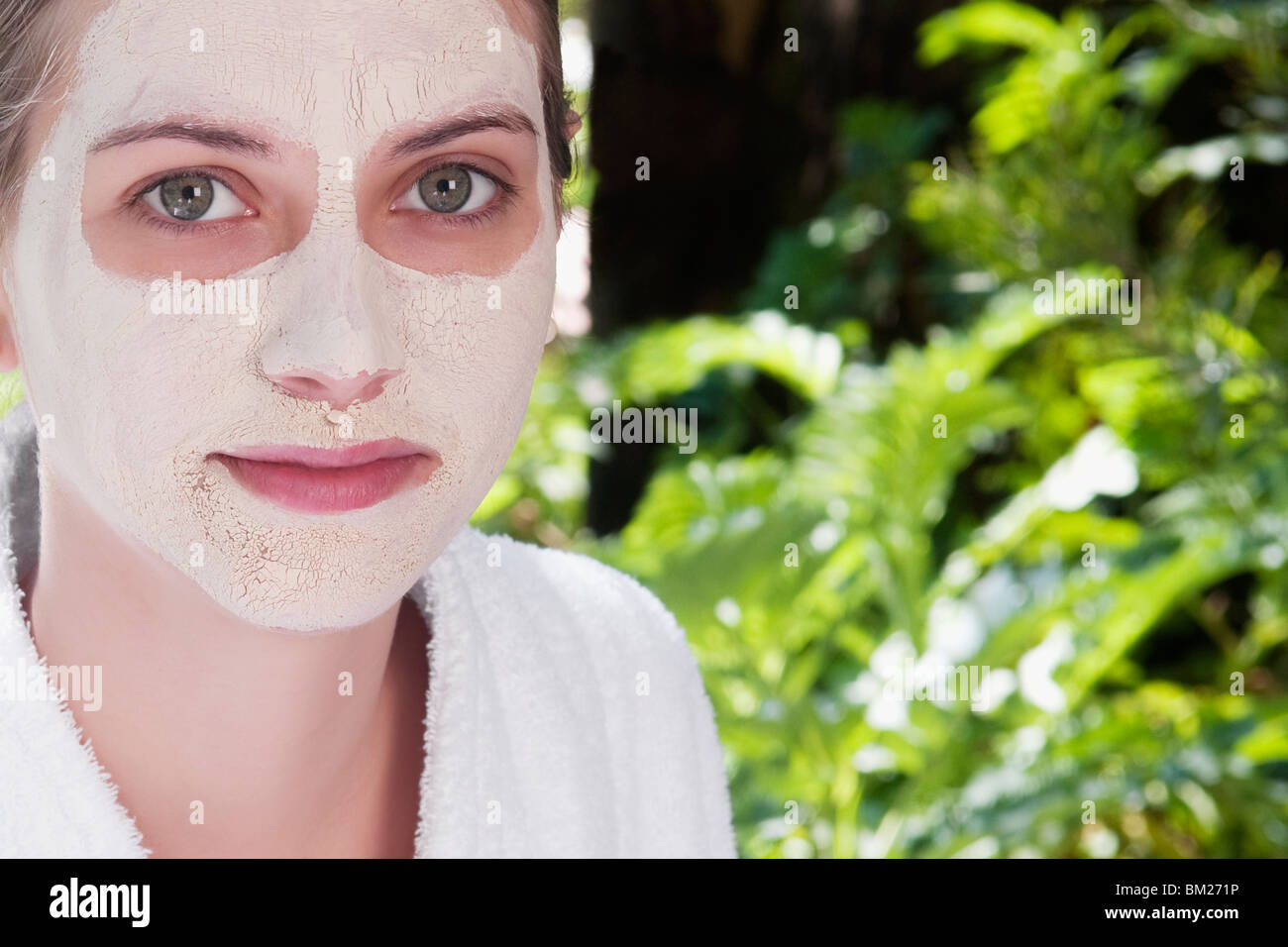Woman with facial mask on her face Stock Photo - Alamy