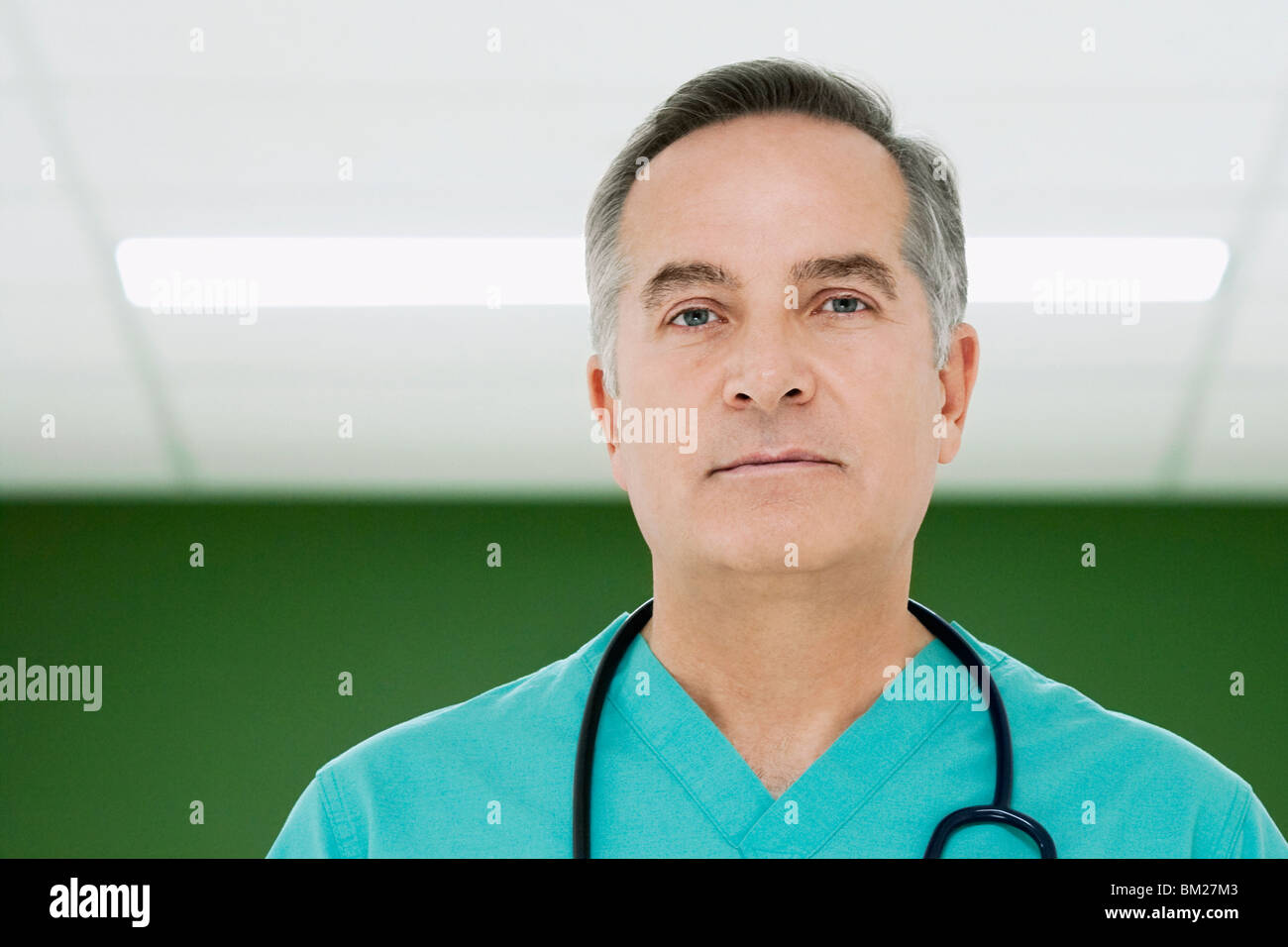 Portrait of a surgeon smiling Stock Photo - Alamy