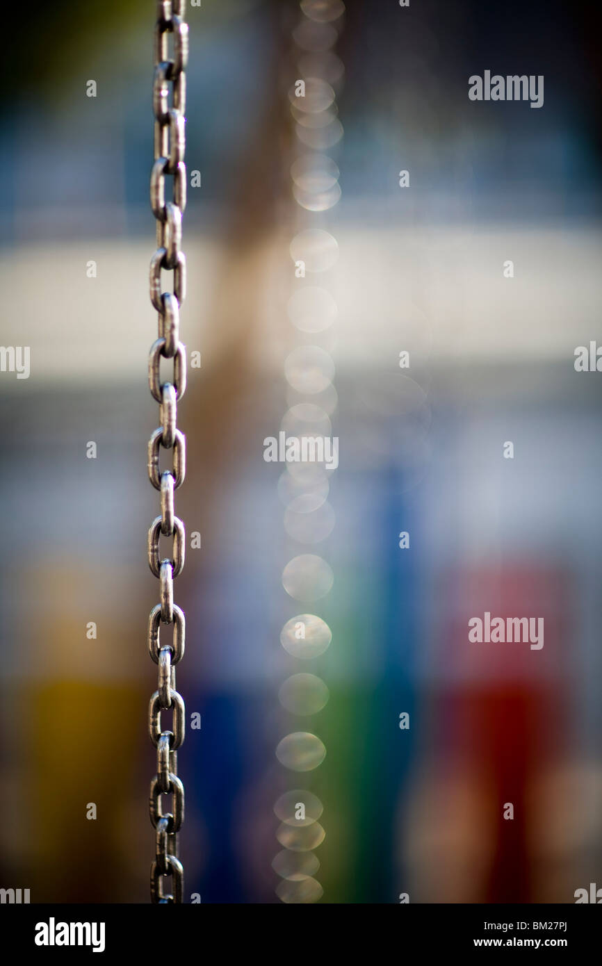 Chain of a swing, Seville, Spain Stock Photo - Alamy