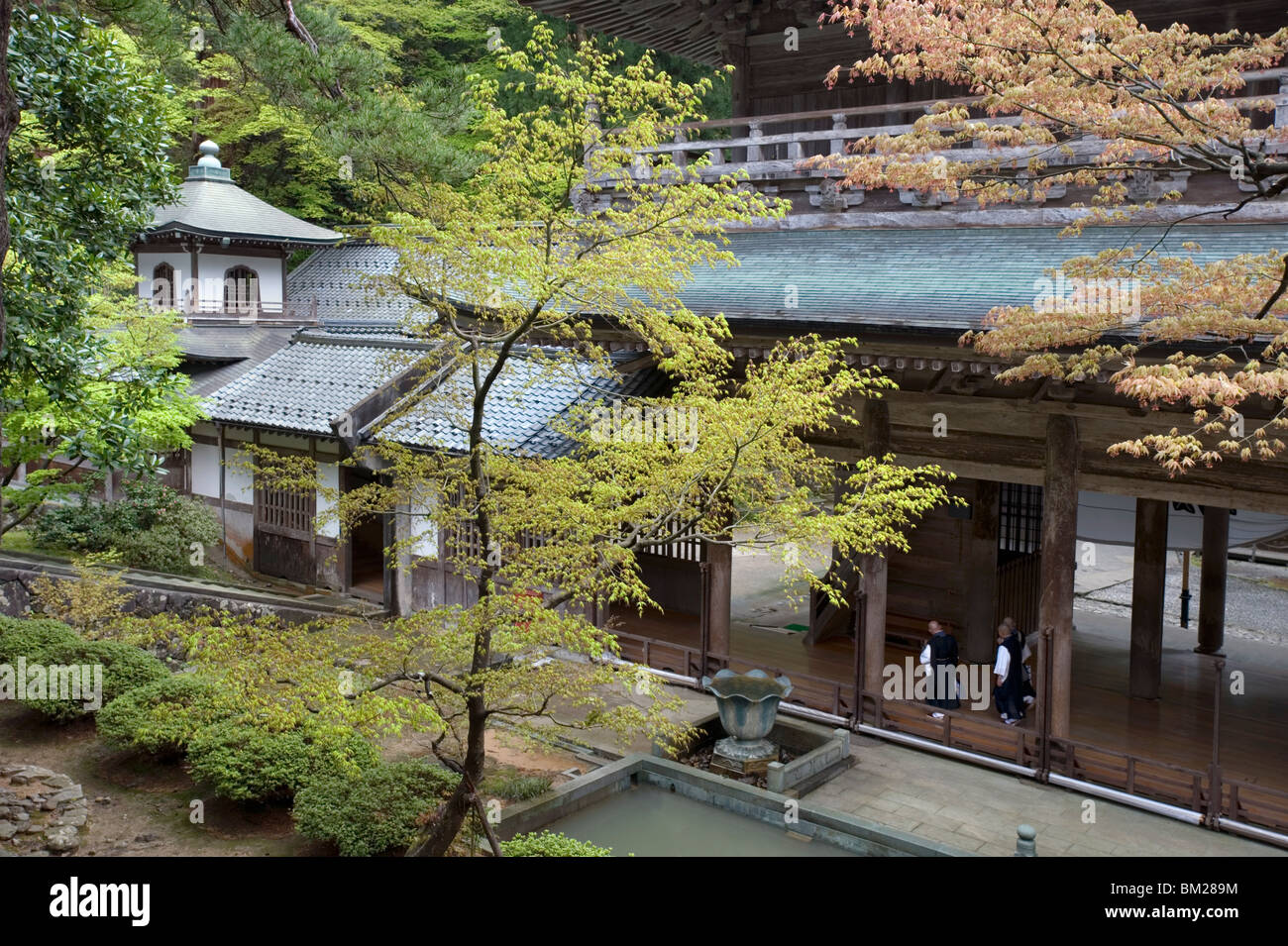 Monks inside main Sanmon Gate at Eiheiji Temple, headquarters of the ...