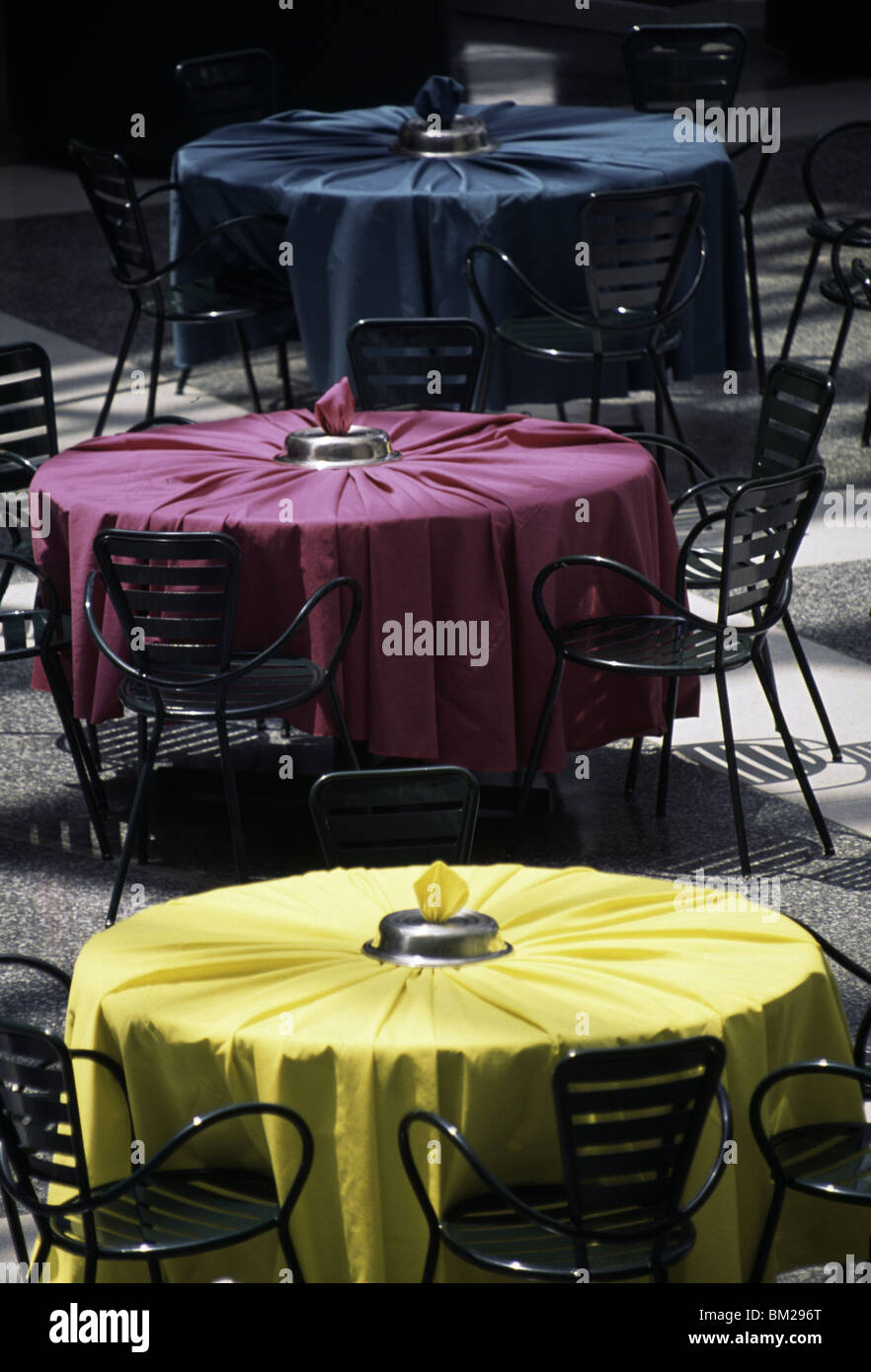 Dining tables in the courtyard Stock Photo - Alamy