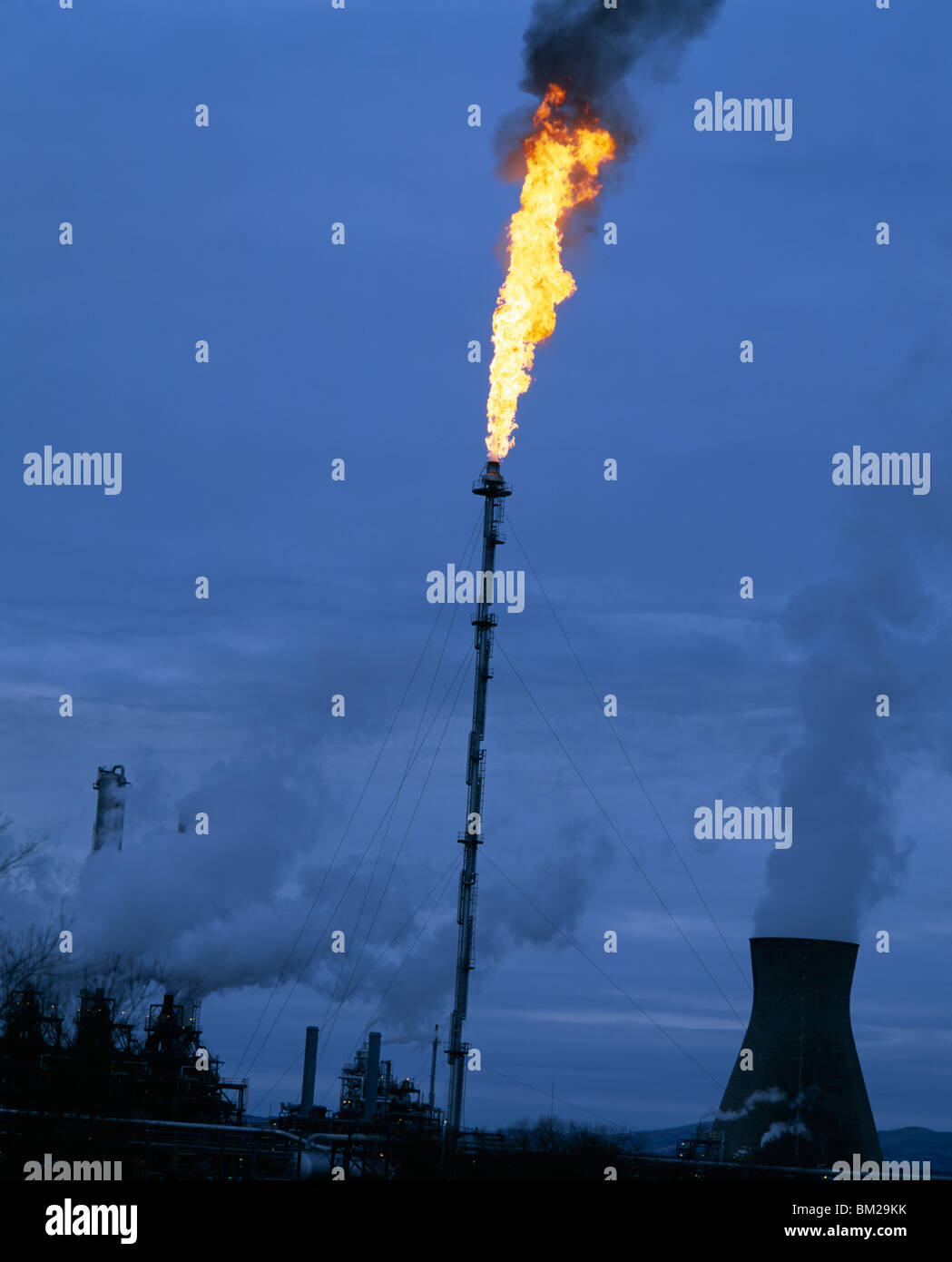 Smoke and flame emitting from an oil refinery, Scotland Stock Photo - Alamy