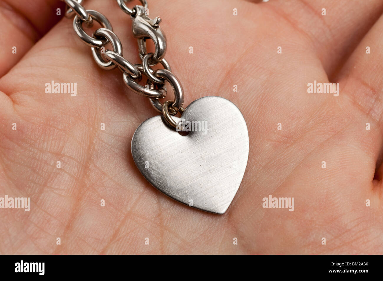 Holding metal chain hi-res stock photography and images - Alamy