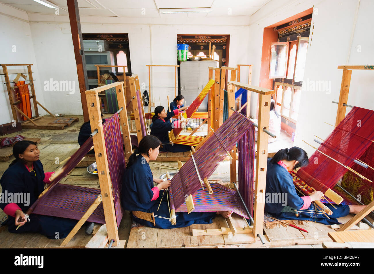Weavers at the National Institute for Zorig Chusum Pedzoe, (Painting School), Thimphu, Bhutan ...