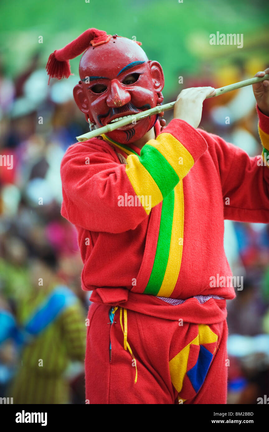 Flute playing dancer, Autumn Tsechu (festival) at Trashi Chhoe Dzong ...
