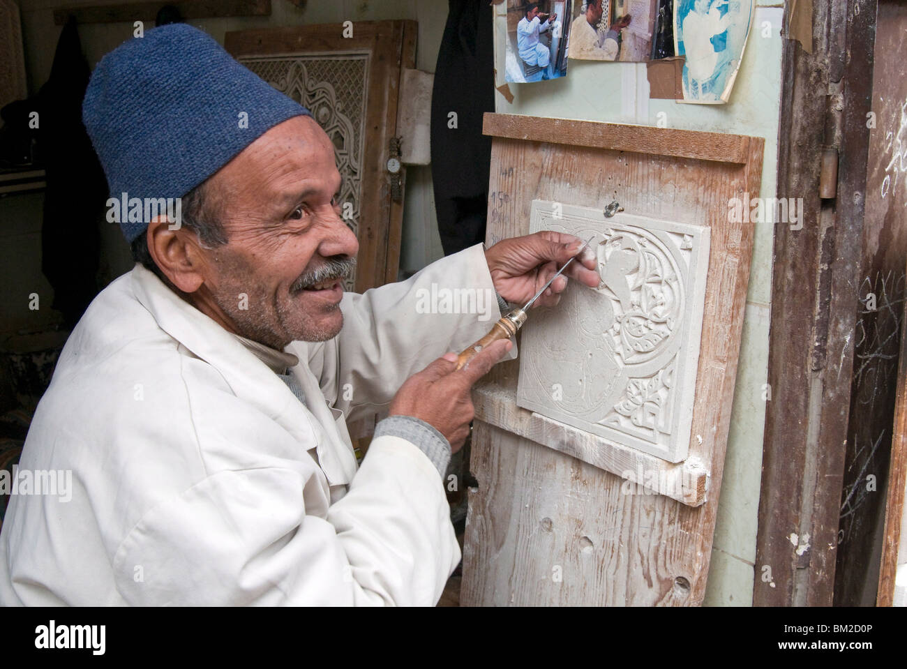 Craftsman at work on stucco carving, the Souk, Marrakech (Marrakesh ...