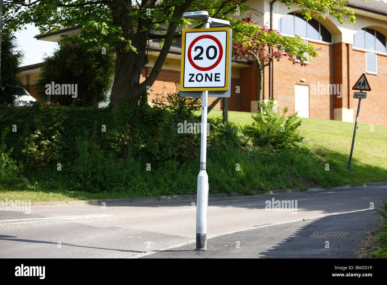 A 20mph zone road sign in a school area of a town - the new speed limit ...