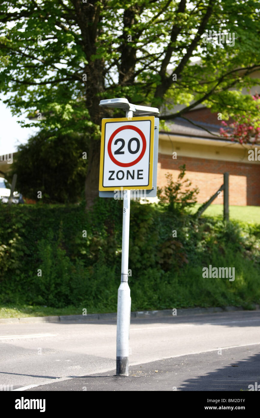 A 20mph zone road sign in a school area of an English town Stock Photo ...