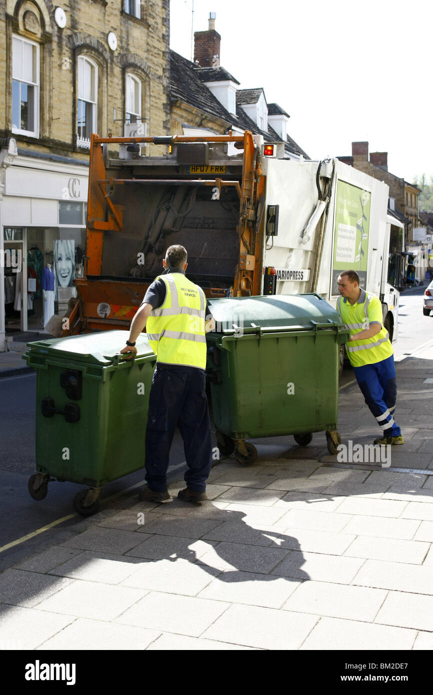Dustbin men at work on Rubbish collection day in an English town Stock Photo Alamy