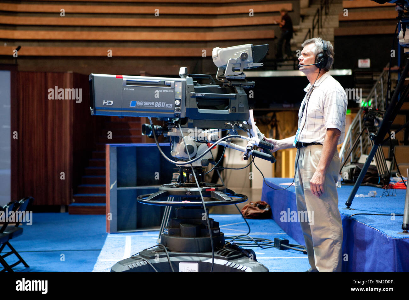 Cameraman and HD Camera (Side Stock Photo - Alamy