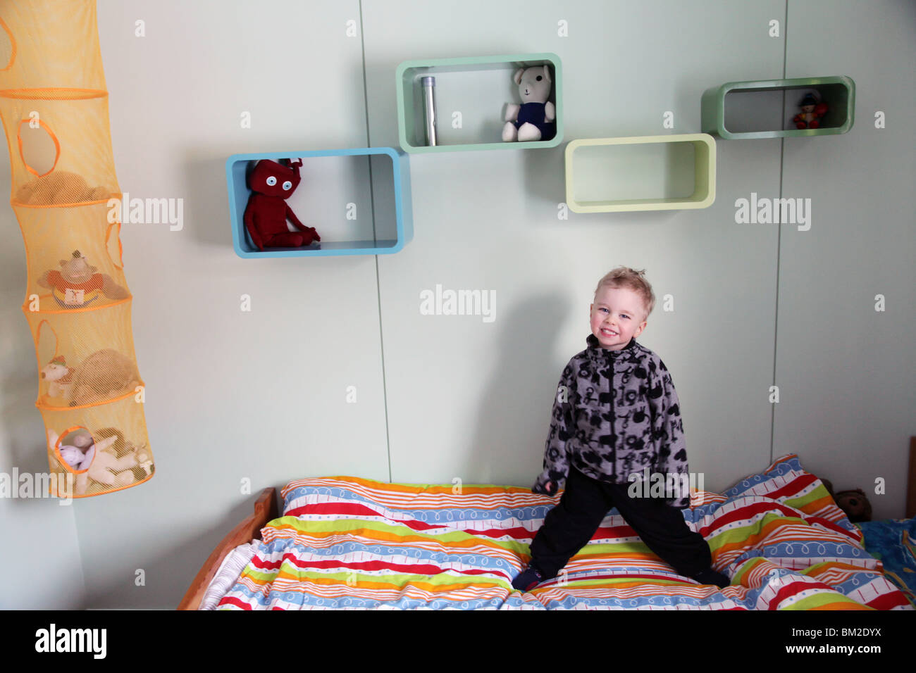 Baby stands hi-res stock photography and images - Alamy