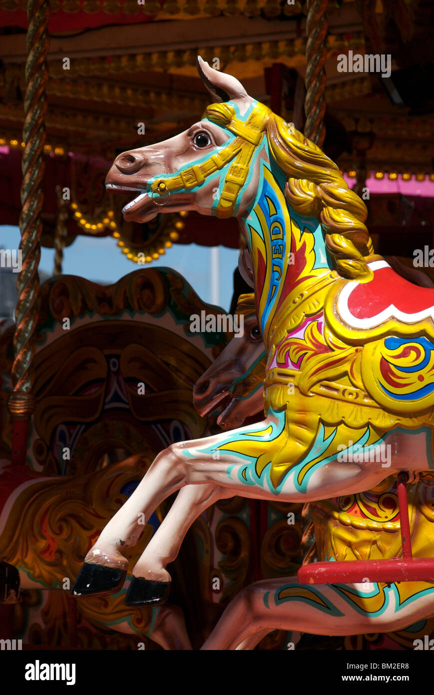Colourful fairground horse ride, Plymouth, Devon, UK Stock Photo - Alamy