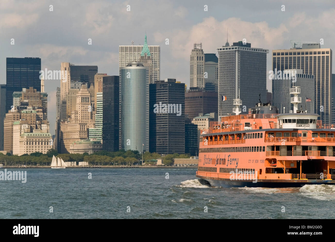 The famous orange Staten Island Ferry approaches lower Manhattan, New ...