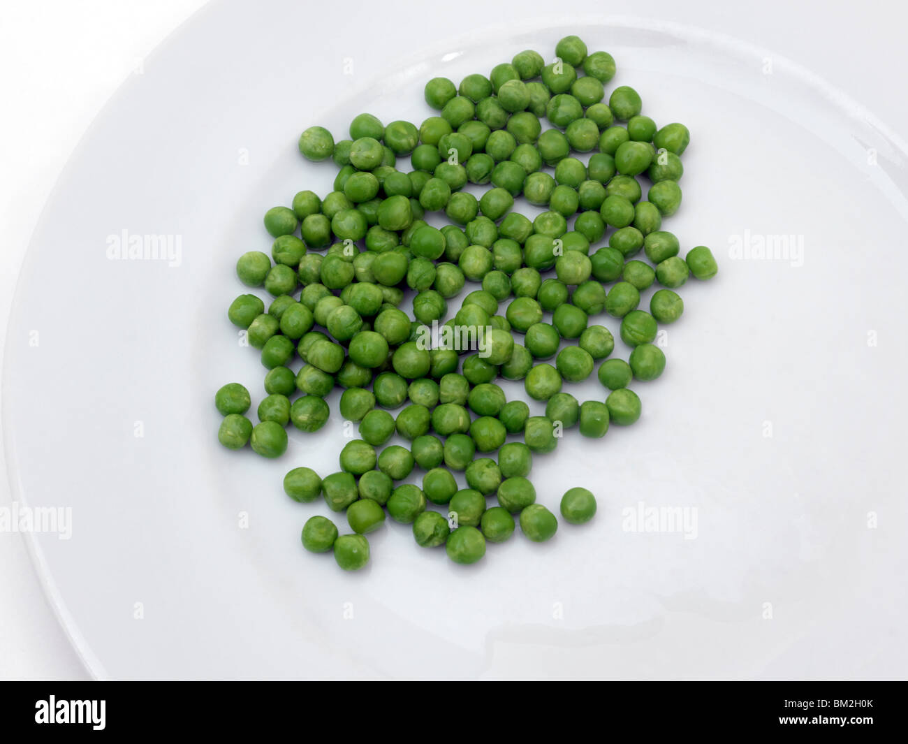 Peas On A Plate Stock Photo - Alamy