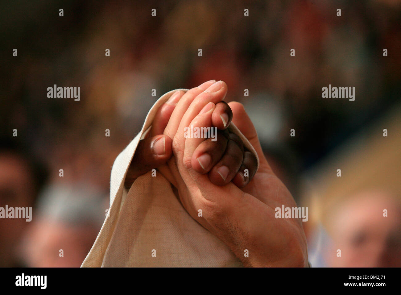 Close up priests hand hi-res stock photography and images - Alamy