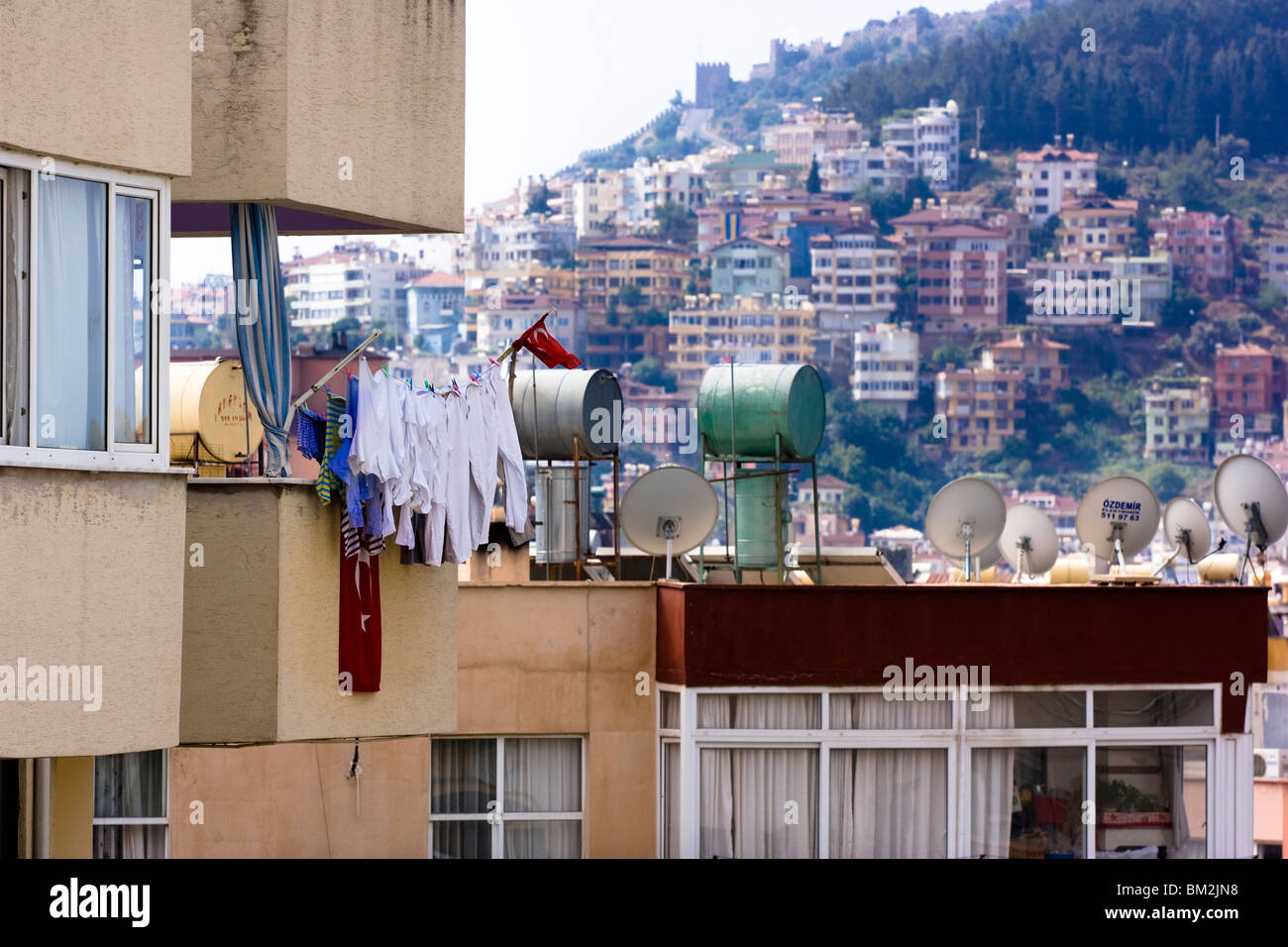 Washing line outside building in Alanya, Turkey Stock Photo - Alamy