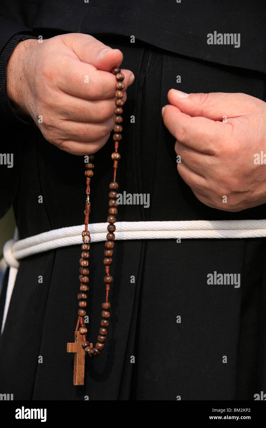 Monk holding prayer beads hi-res stock photography and images - Alamy