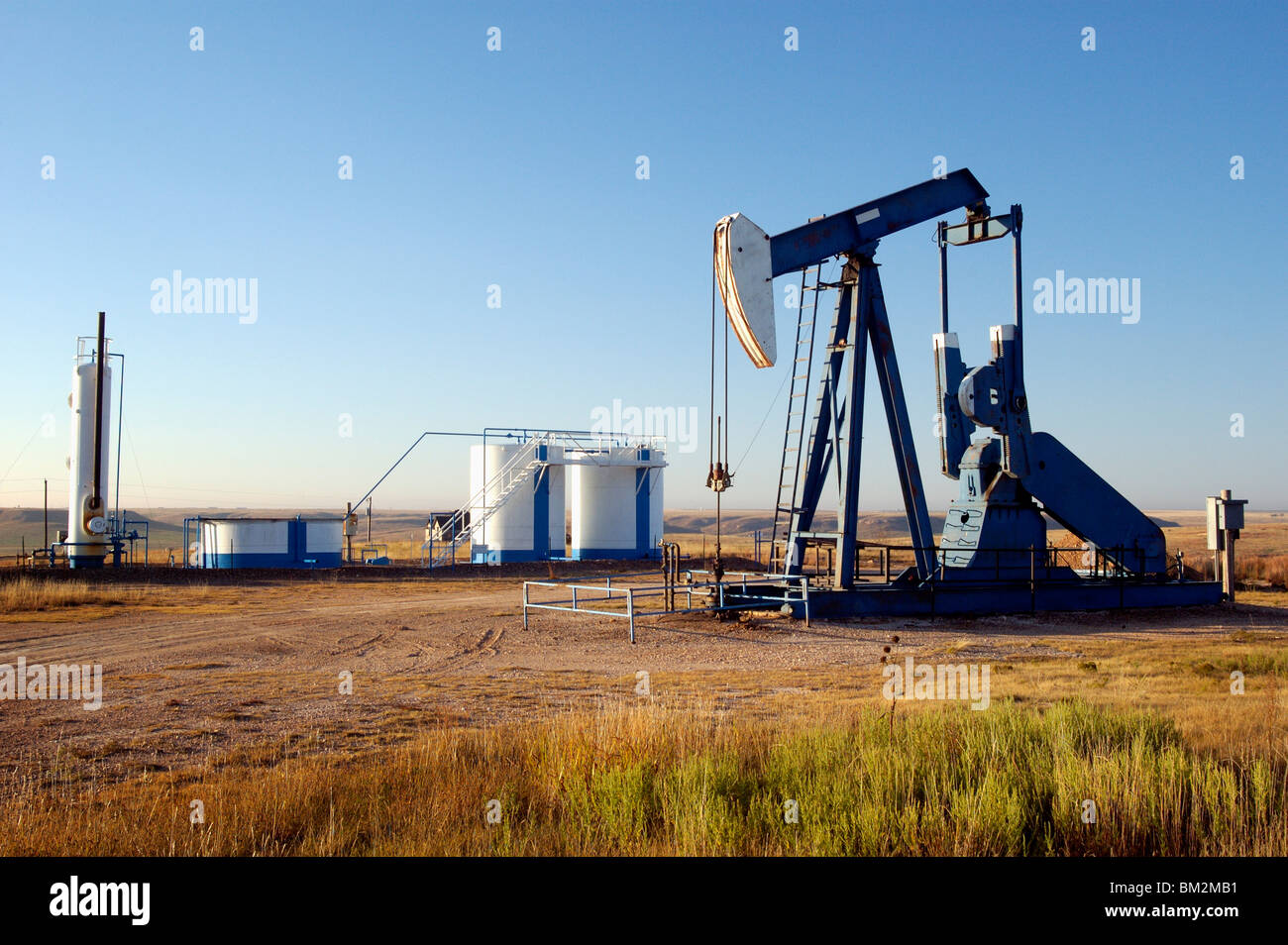 Oil well and storage tanks in the Texas Panhandle Stock Photo - Alamy