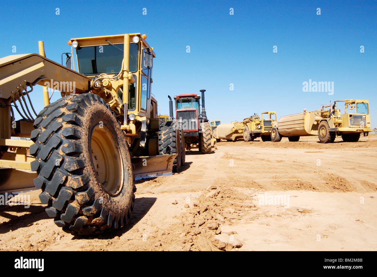 Heavy construction equipment on a construction site Stock Photo - Alamy