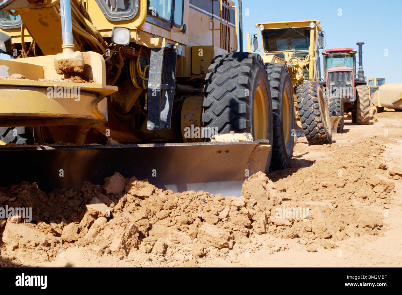 Heavy construction equipment on a construction site Stock Photo - Alamy