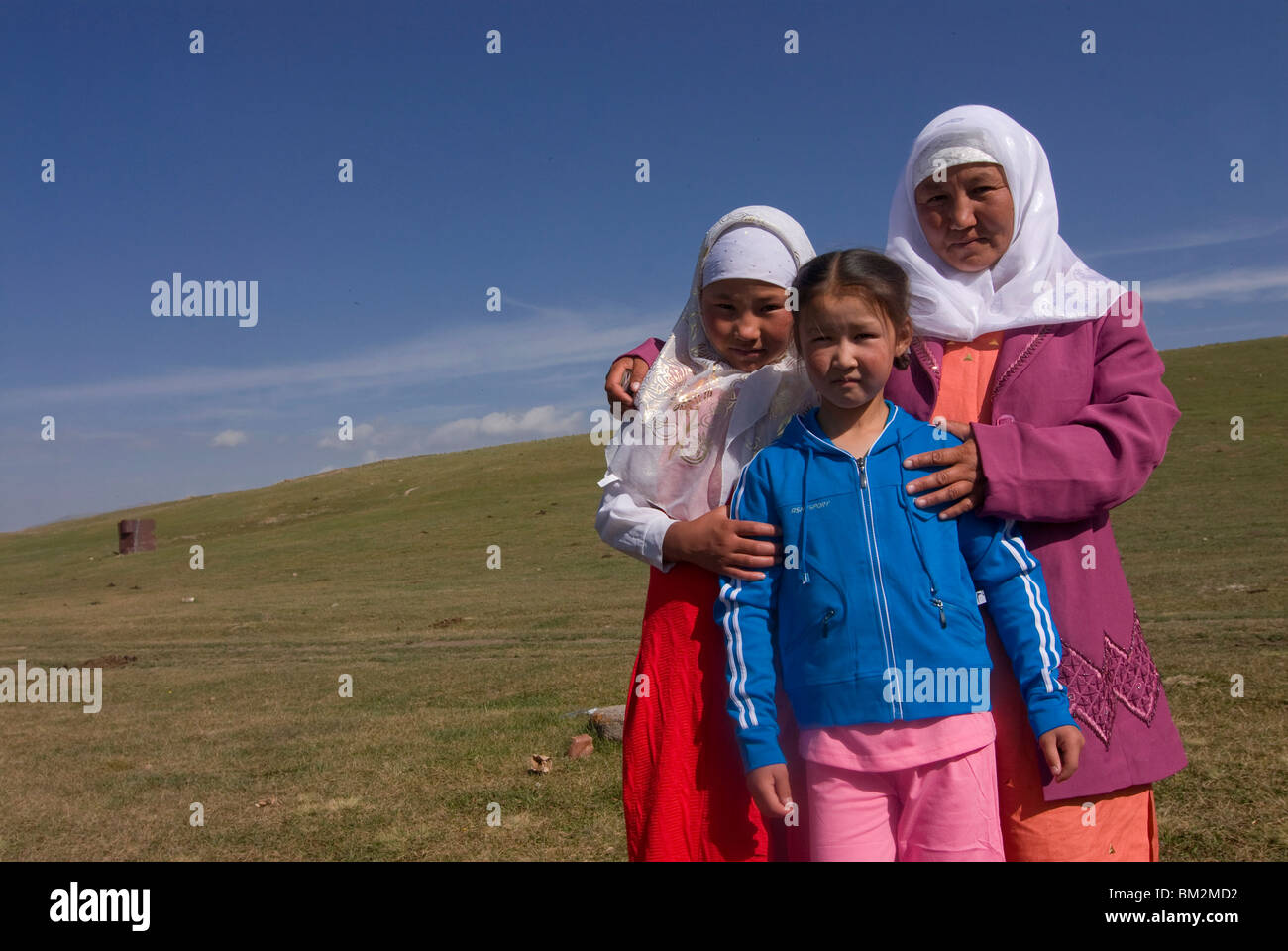 Happy nomad mother and daughters, Song Kol, Kyrgyzstan Stock Photo - Alamy