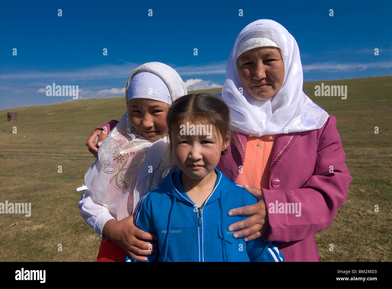 Happy nomad family, Song Kol, Kyrgyzstan Stock Photo - Alamy