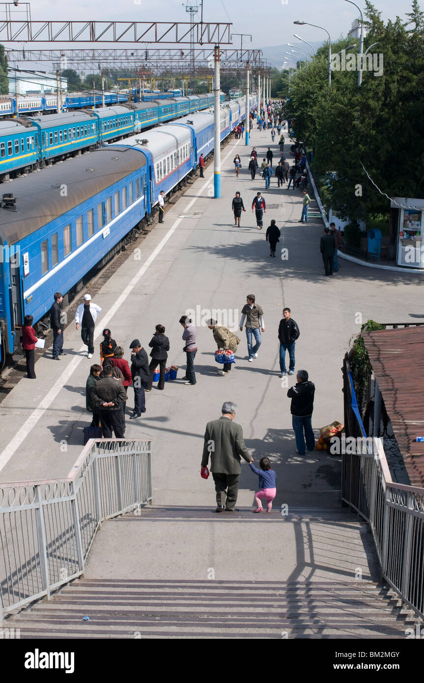 Railway station of alma ata with passengers and trains hi-res stock ...