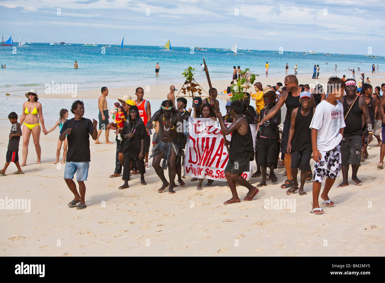 Parade along White Beach during the Ati-Atihan Festival, an annual ...