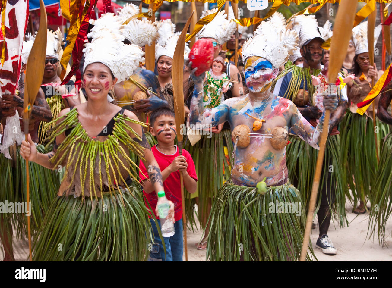 Parade along White Beach during the Ati-Atihan Festival, an annual ...