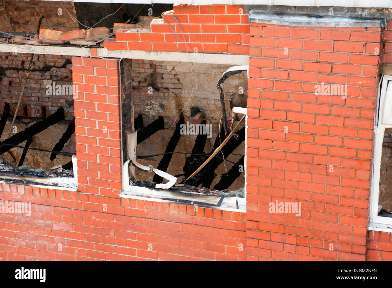 Large factory and warehouse collapsed and smoldering following major ...
