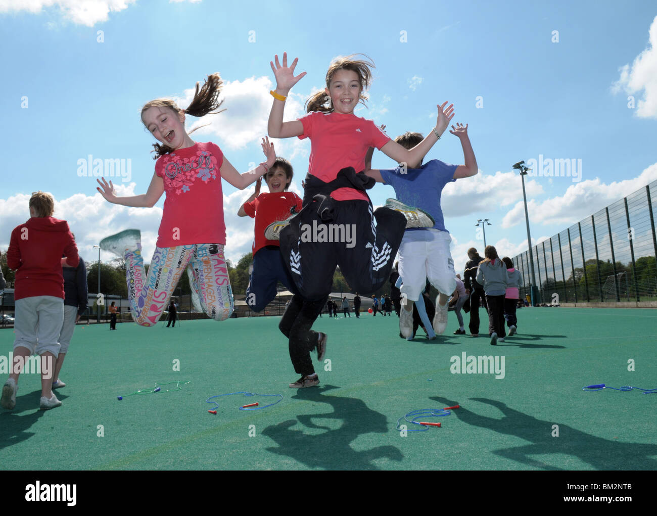 A group of children leaping for joy Stock Photo - Alamy