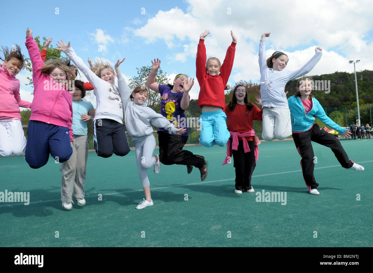 A group of children leaping for joy Stock Photo - Alamy