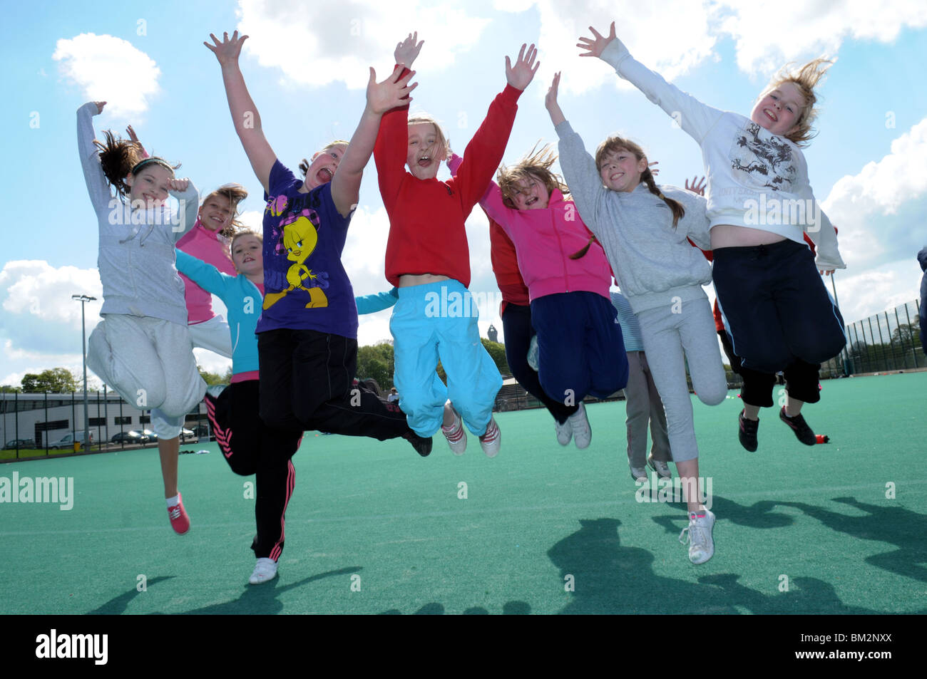A group of children leaping for joy Stock Photo - Alamy