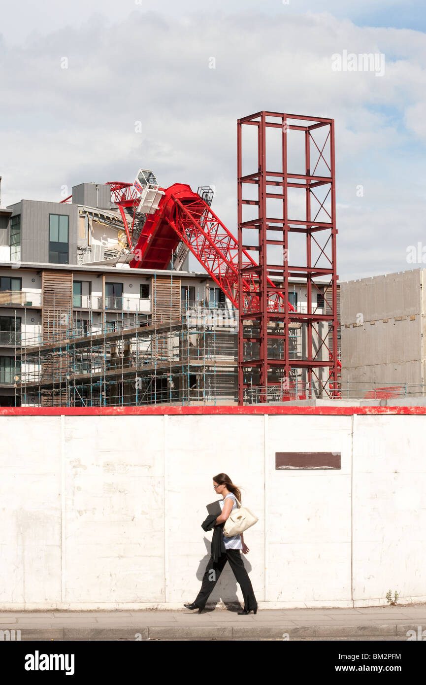 Tower crane fallen over onto roof at building site Stock Photo - Alamy