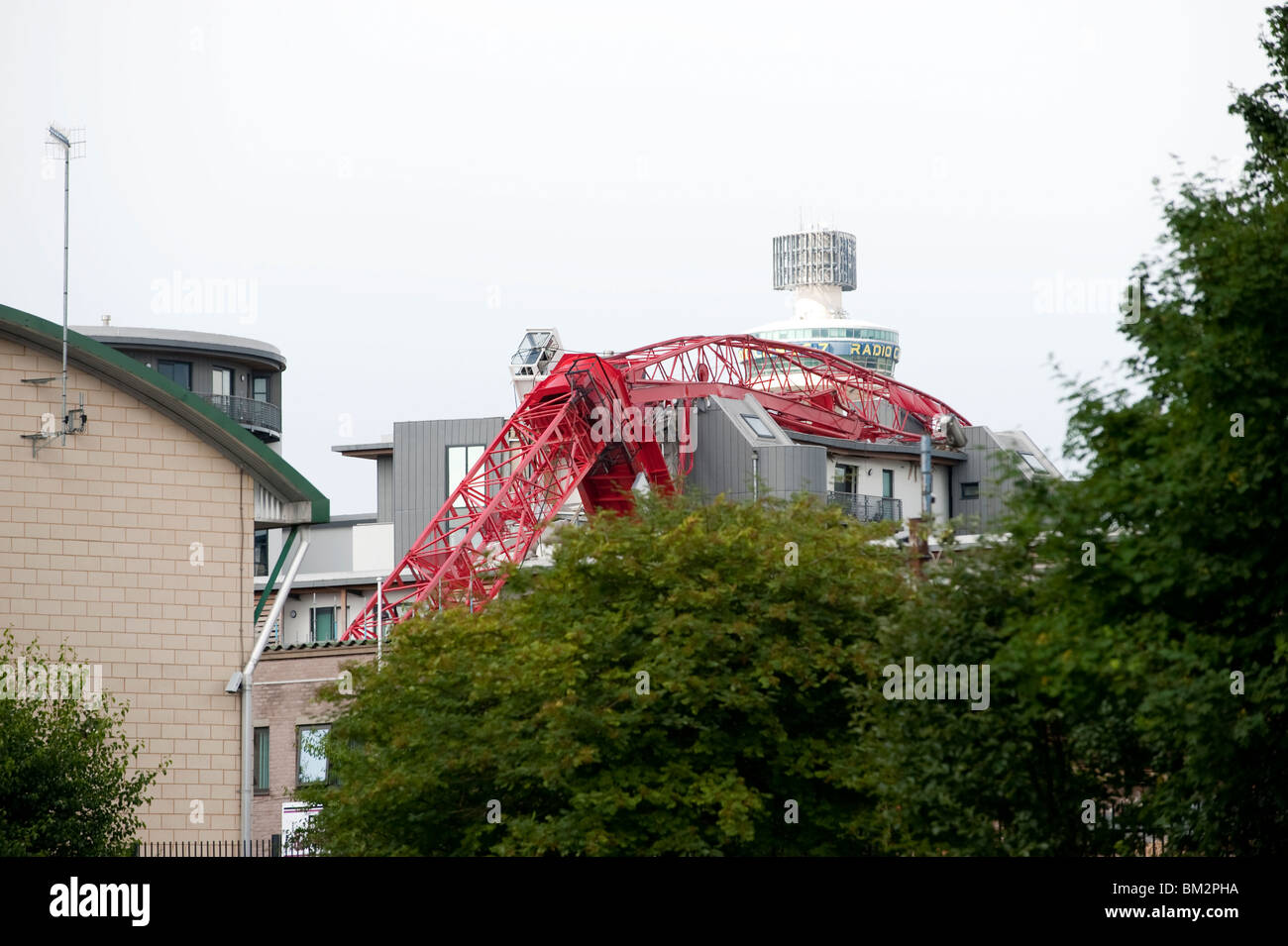 Tower crane collapsed at building site onto roof UK Stock Photo - Alamy