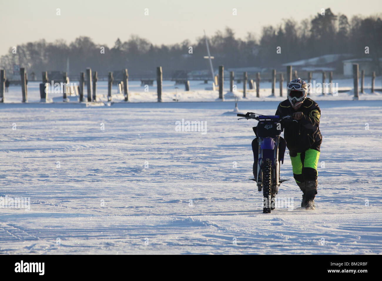 East Harbour Slemmern motorcycle winter frozen road over sea ocean ...