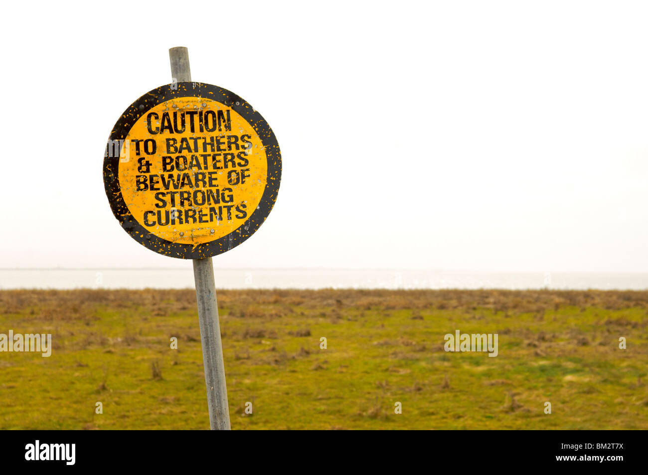 Strong sea and river currents warning sign on beach Stock Photo - Alamy