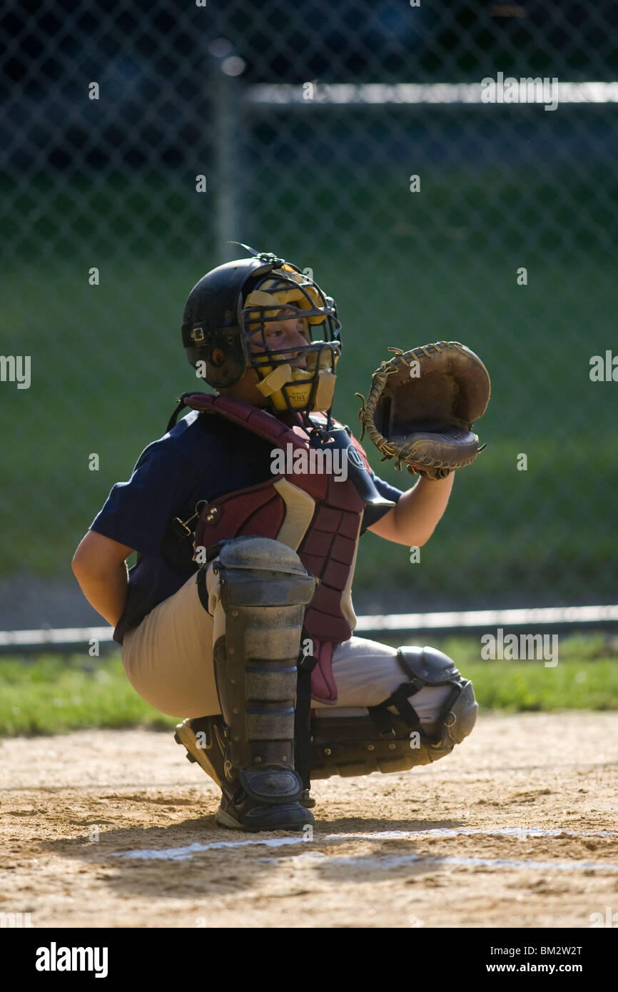 Softball Catchers In Action