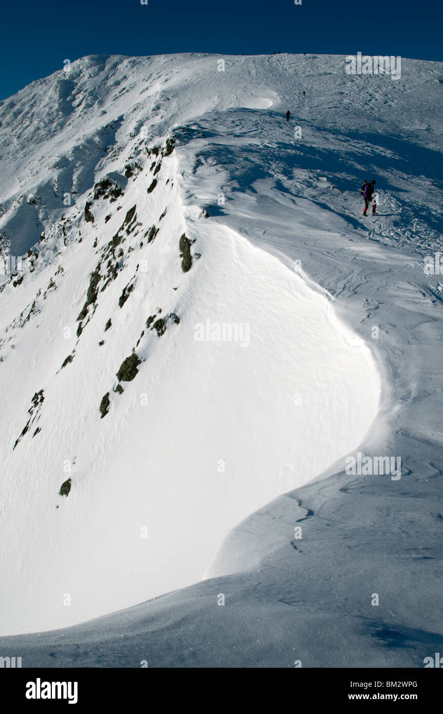 Blencathra summit from the Scales Fell ridge in winter, Lake District ...