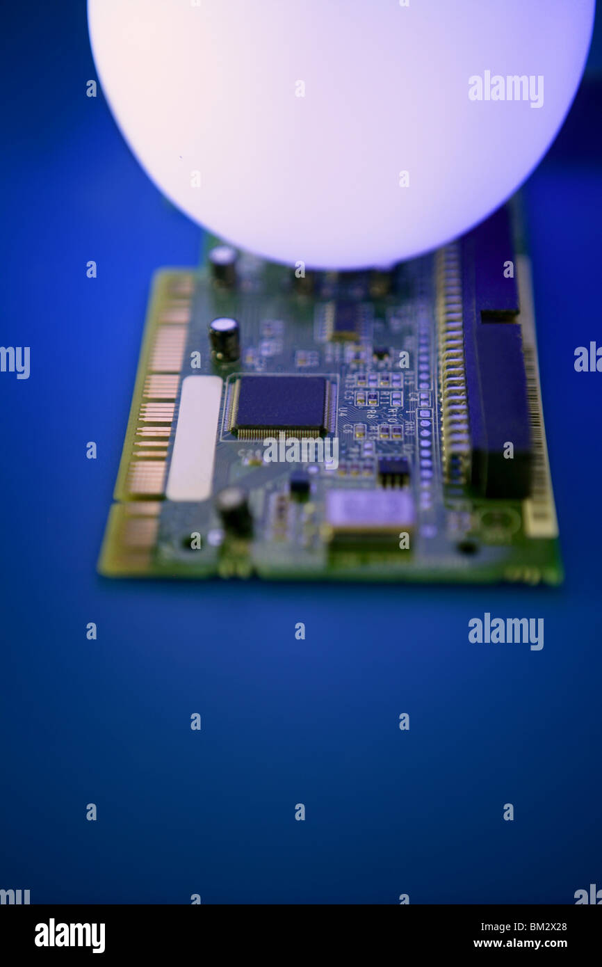Glowing light sphere lighting a technology electronic circuit Stock ...
