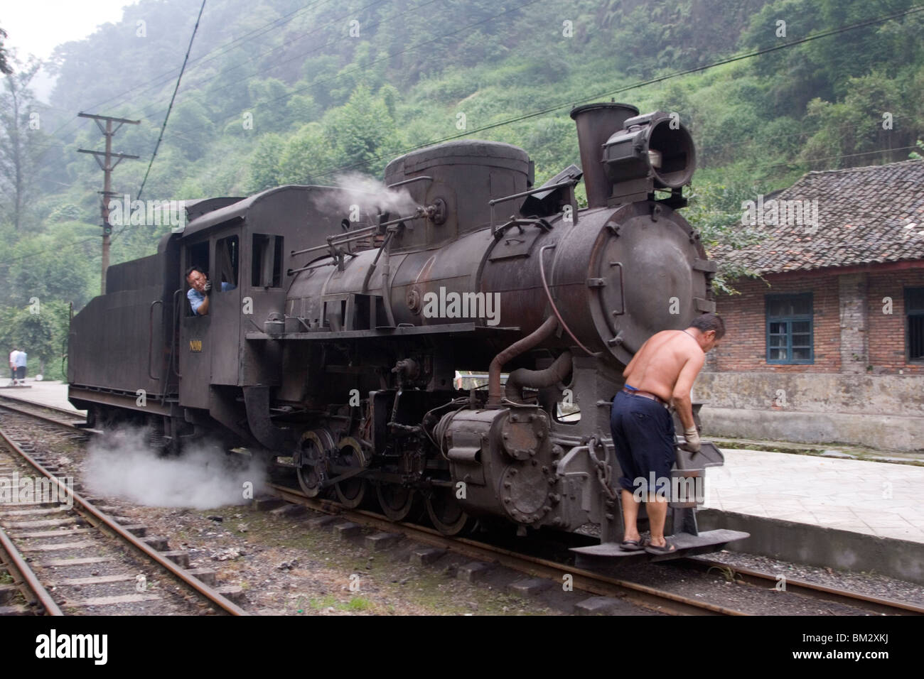 The steam engine of a steam train changing switching direction at the ...