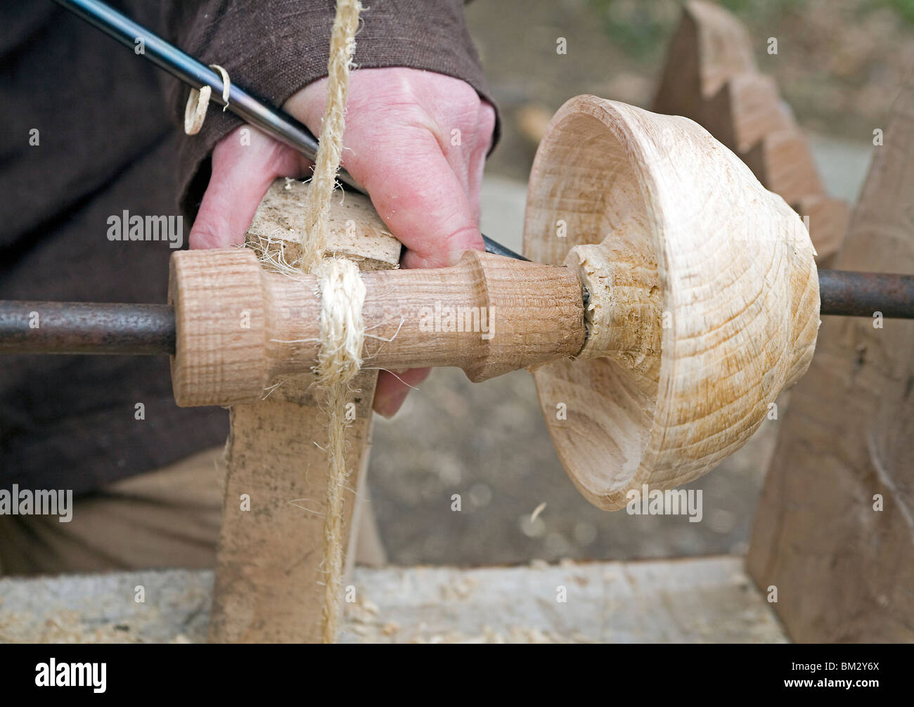 Pre-medieval European handicraft. Turning foot-driven machine with a ...