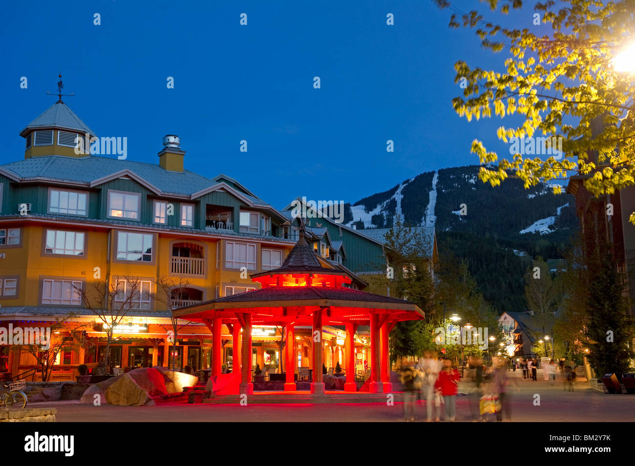 Town Plaza in Whistler Village at Dusk with Whistler Mountain in the ...