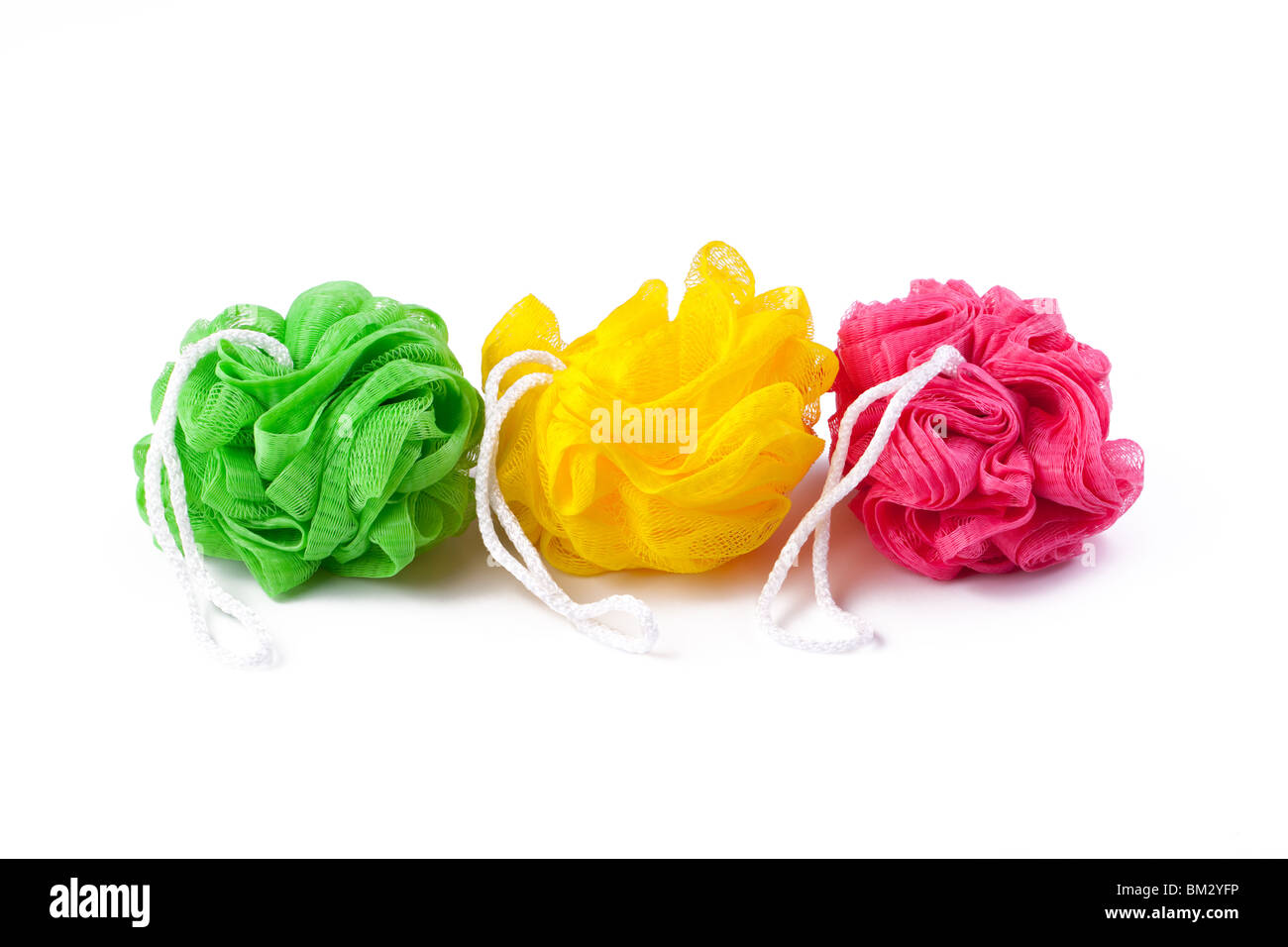 plastic bath sponge on white background Stock Photo - Alamy
