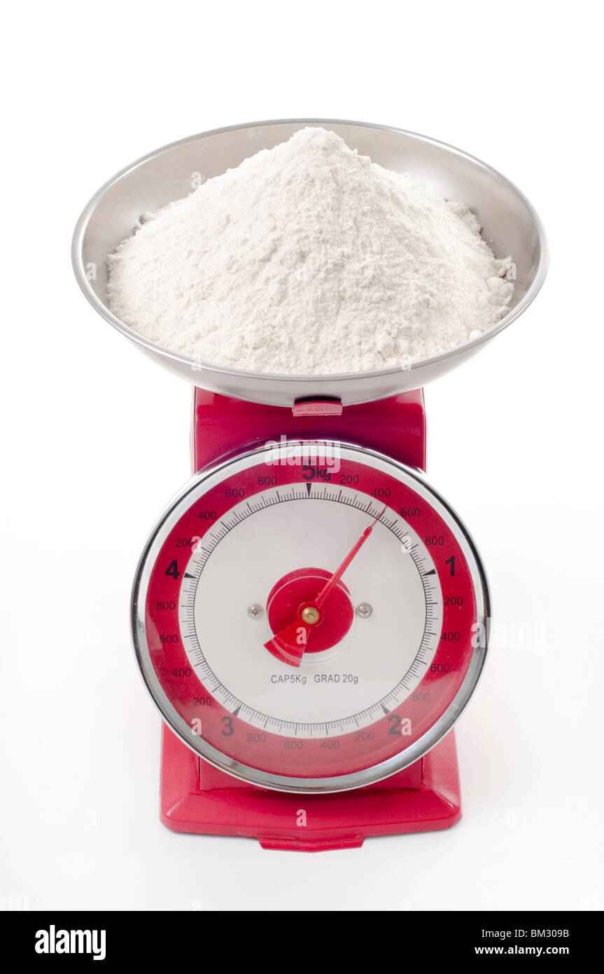 Red weighing scales with flour Stock Photo - Alamy
